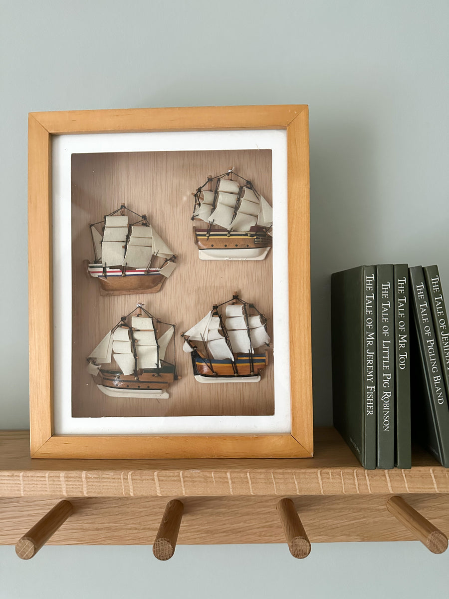 Vintage miniature model ships in frame – Moppet