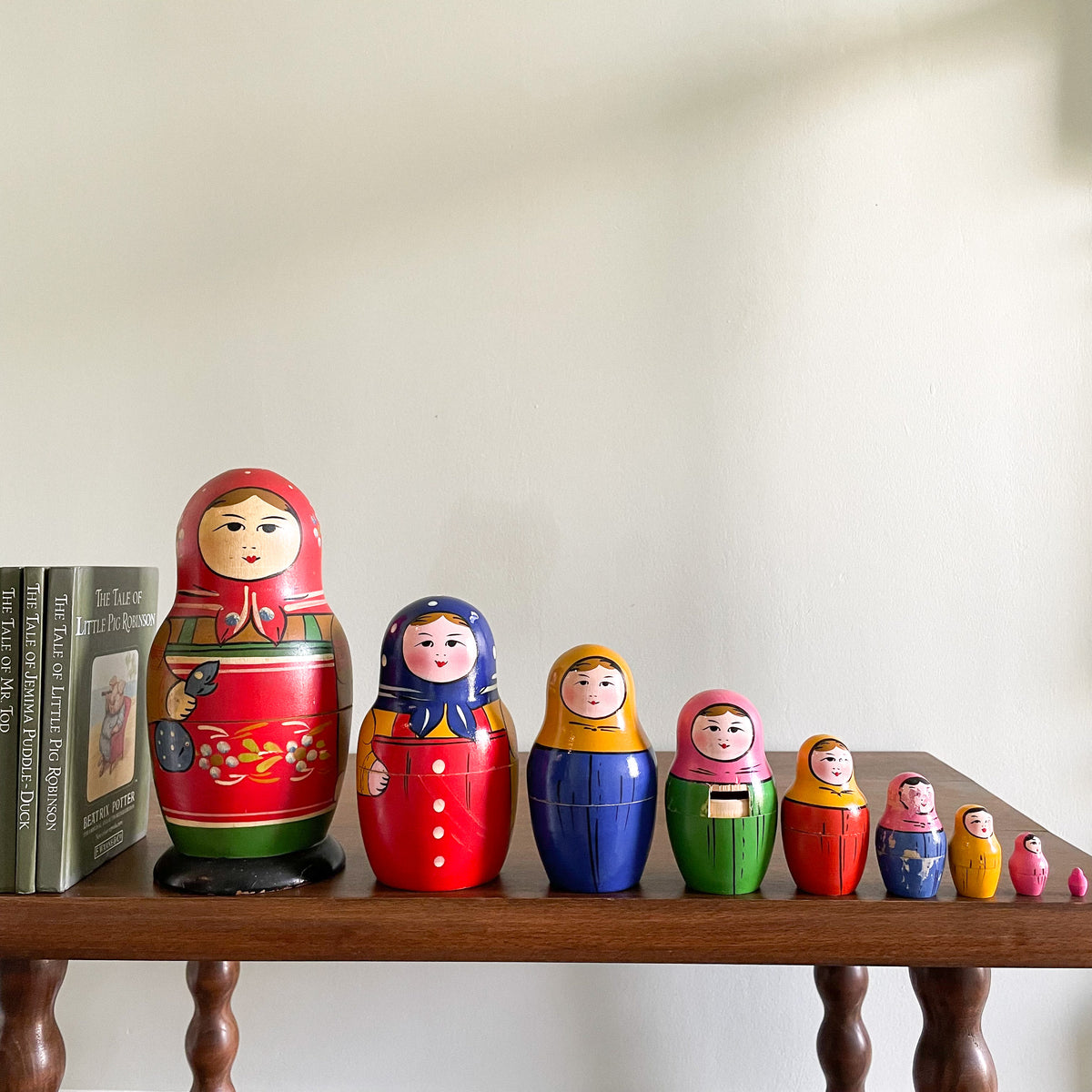 Vintage wooden nesting Russian Matryoshka dolls in rainbow colours – Moppet